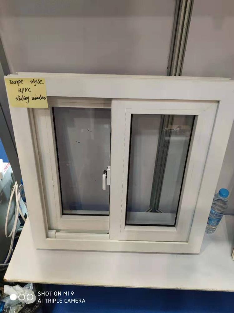French style UPVC sliding windows with fly screen mesh and grill desig ...
